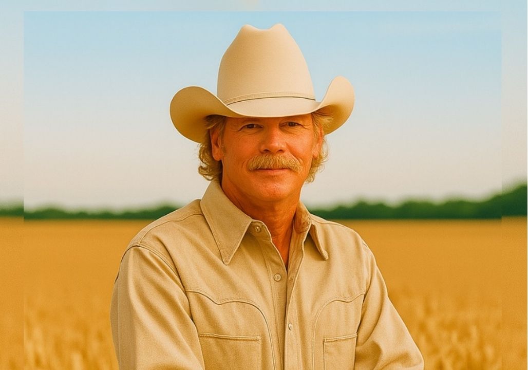 ALAN JACKSON stands alone on a golden field at sunset — a man carved ...
